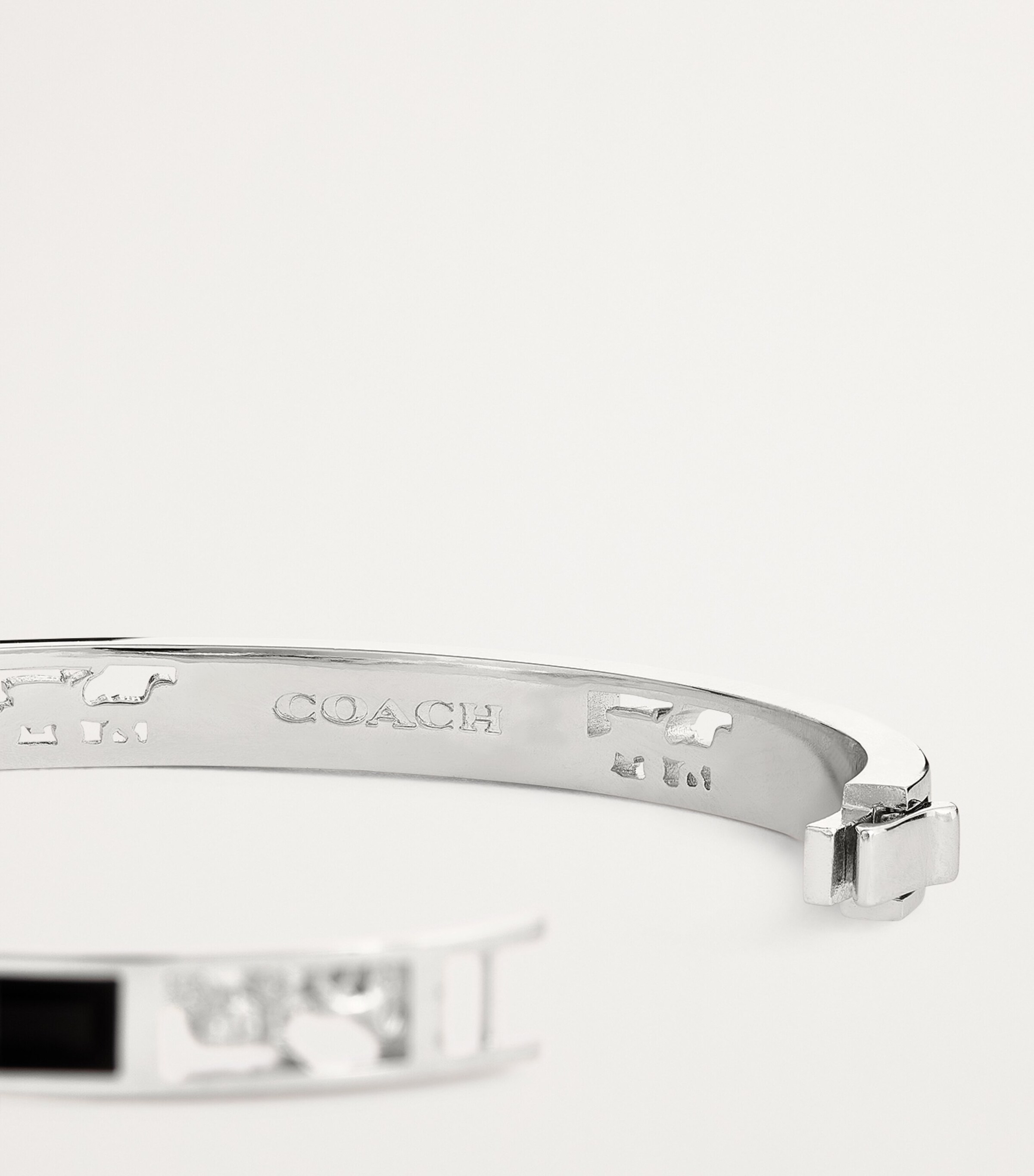 Coach Signature Horse and Carriage Cut-Out Bangle | Harrods UK