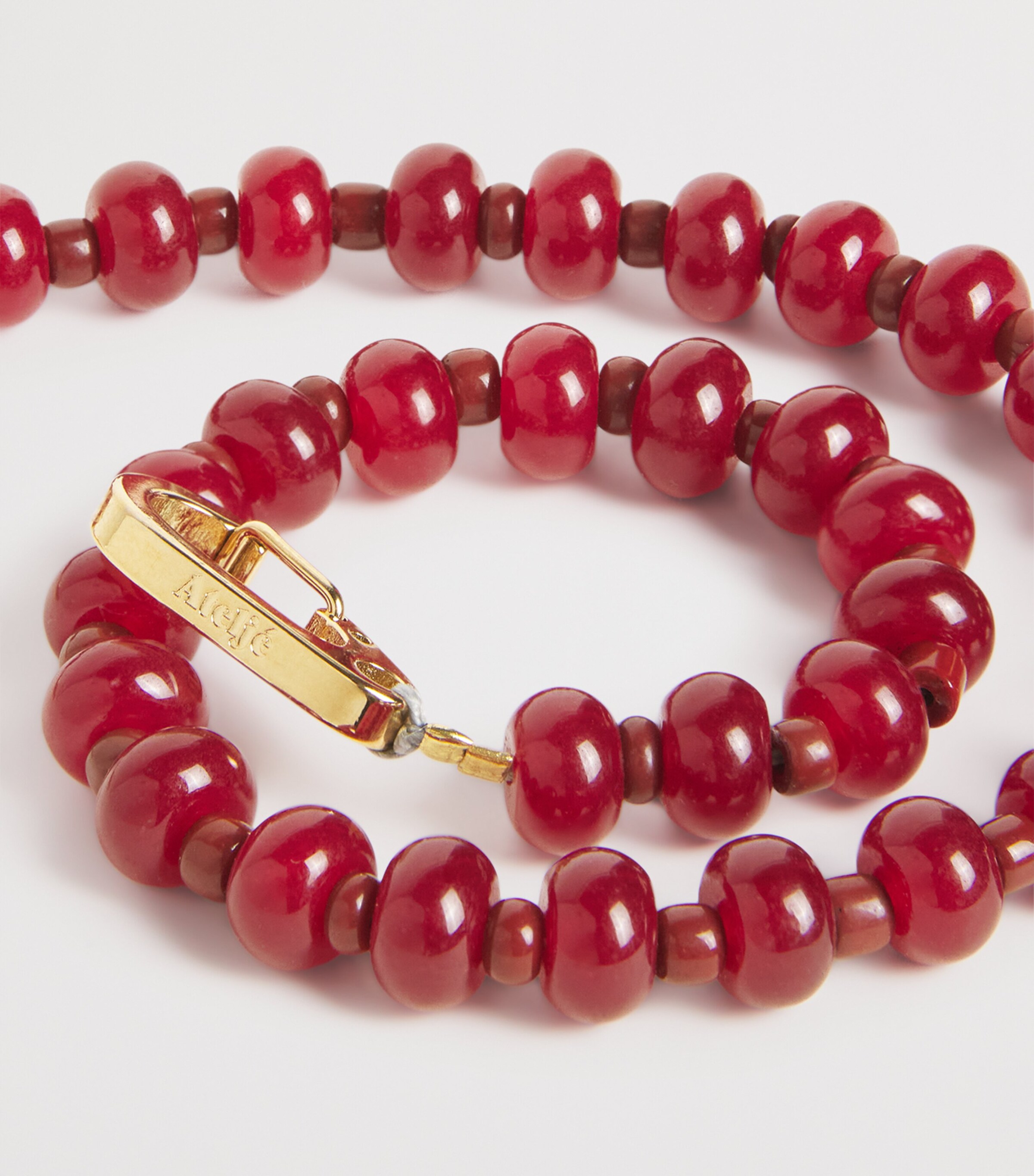 ATELJE Burgundy Beaded Short Phone Cord | Harrods UK