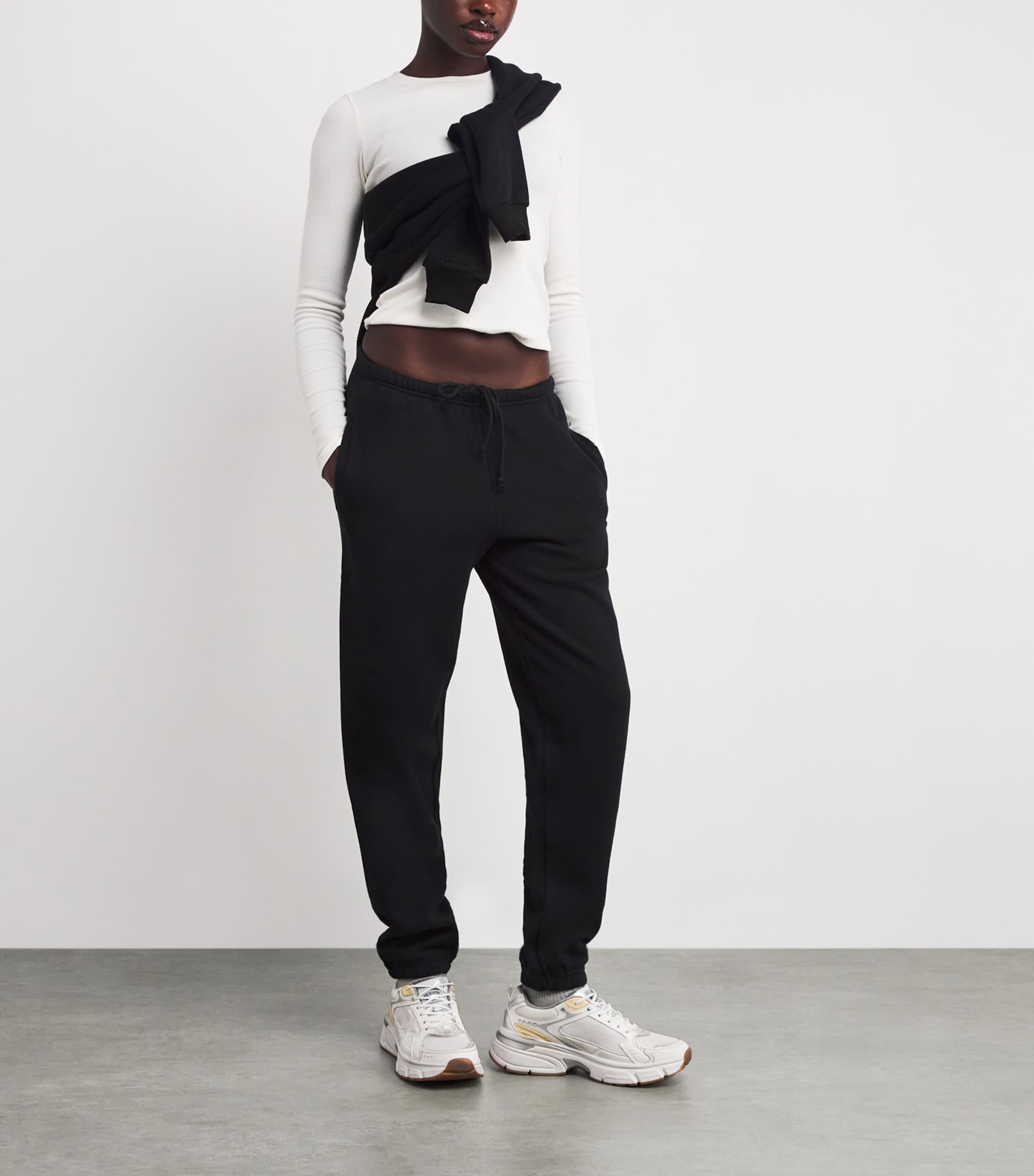 Skims Black Fleece Classic Sweatpants | Harrods IE