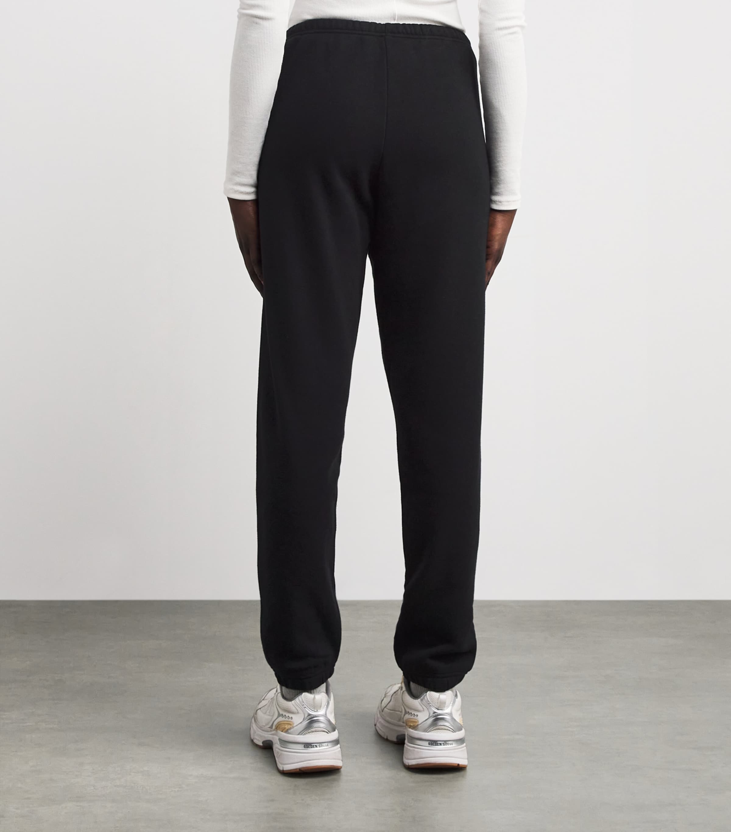 Skims Black Fleece Classic Sweatpants | Harrods IE