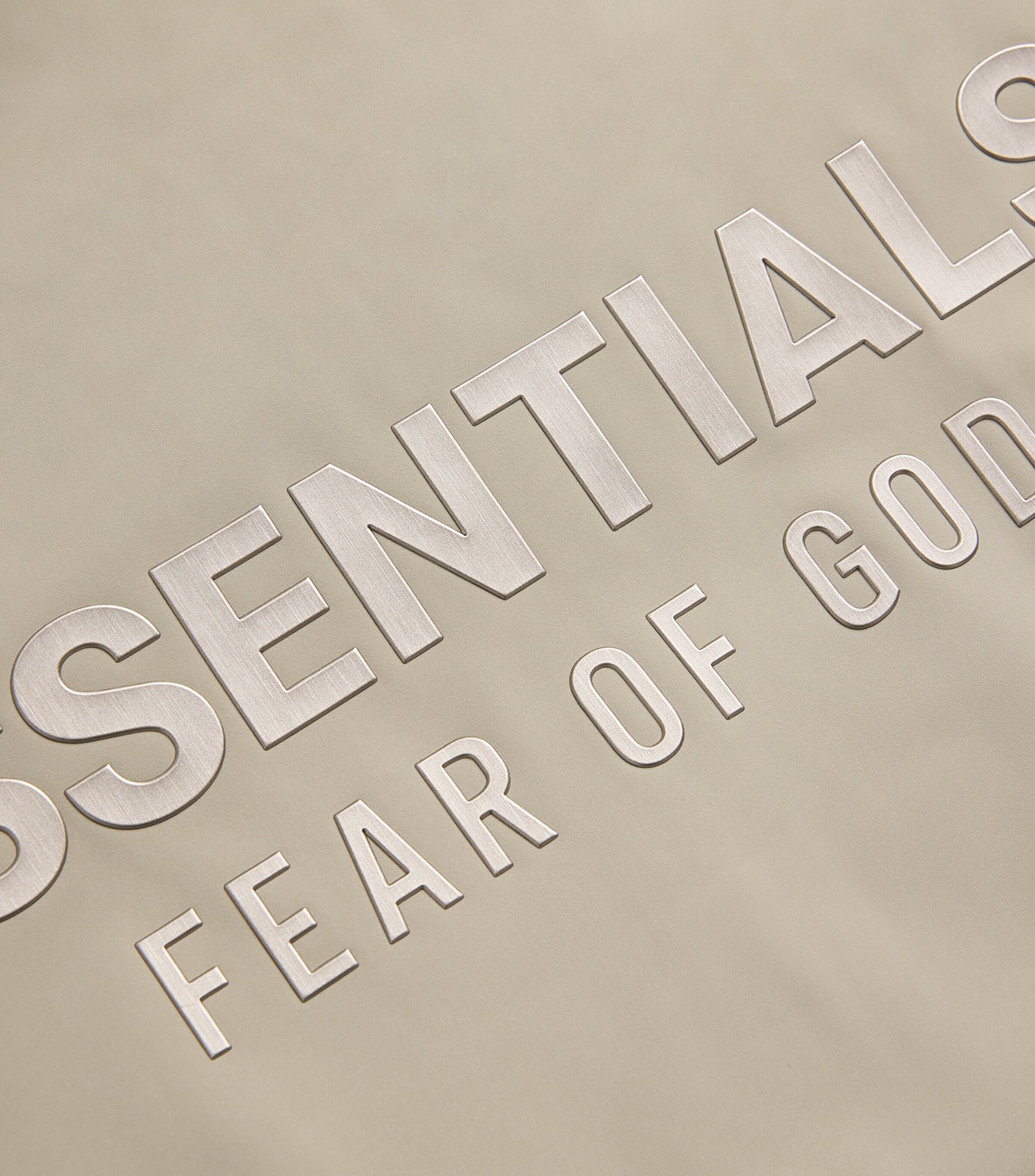 FEAR OF GOD ESSENTIALS Beige Nylon Logo Overcoat | Harrods HK