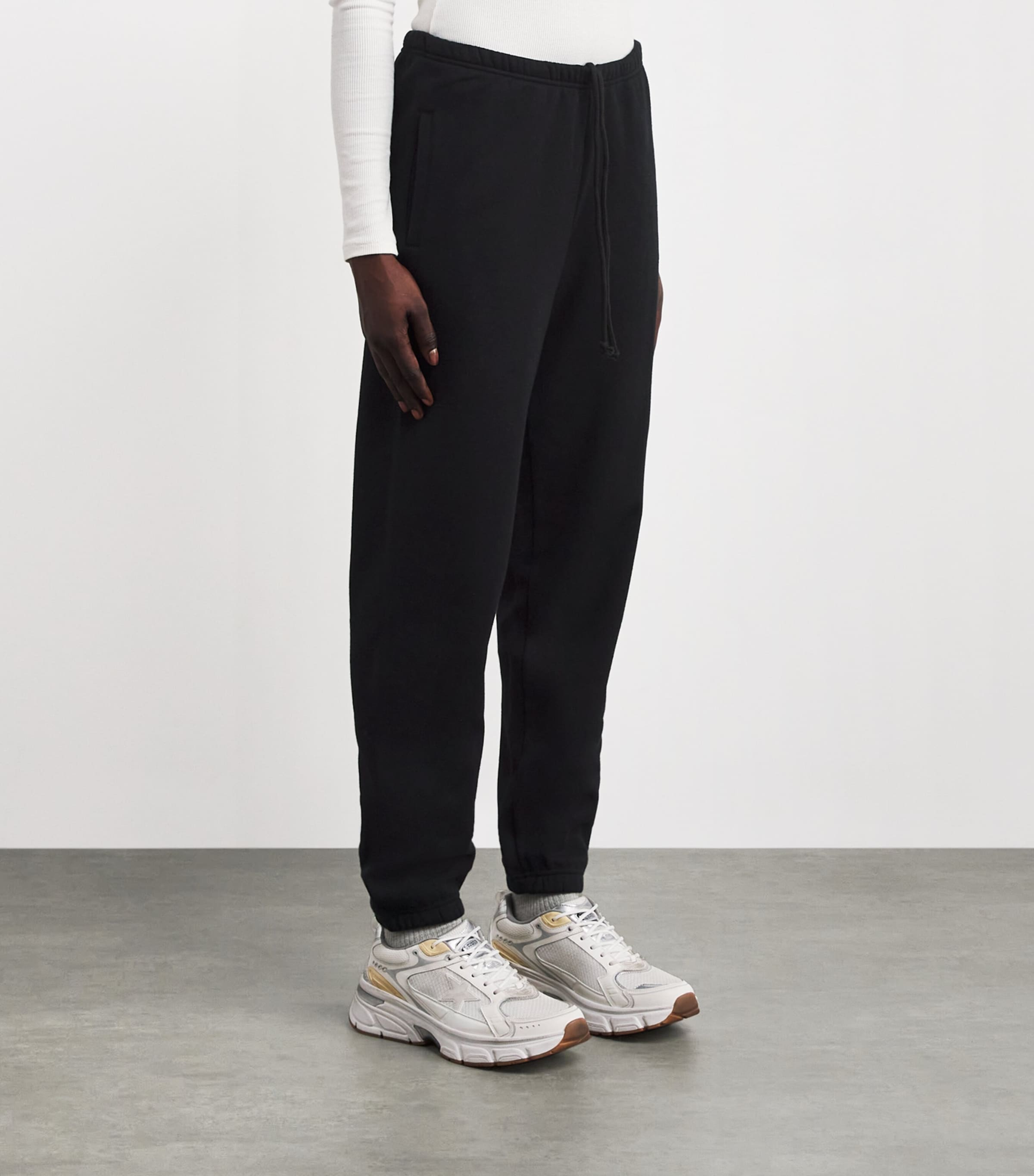 Skims Black Fleece Classic Sweatpants | Harrods IE