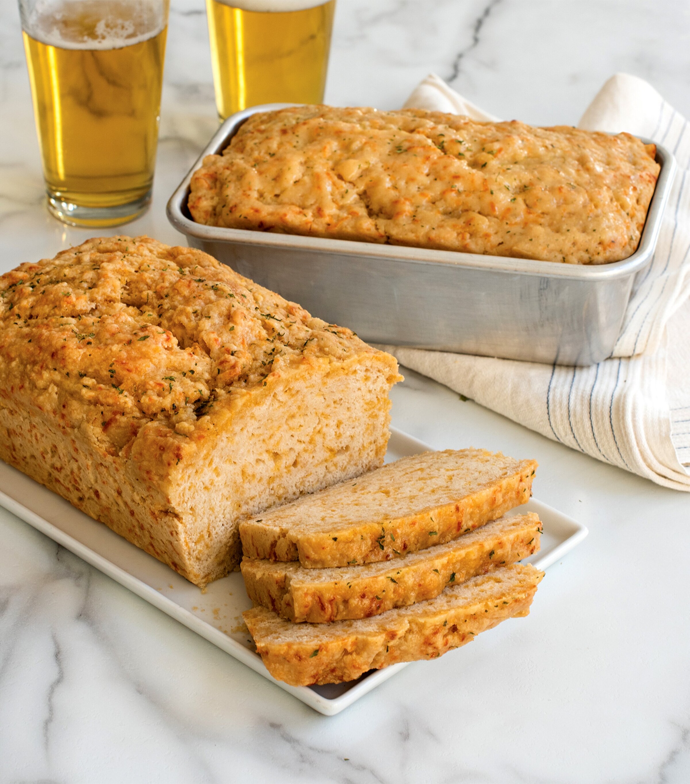 Nordic Ware Set of 4 Aluminium Naturals Loaf Tins (22.5cm) | Harrods AE