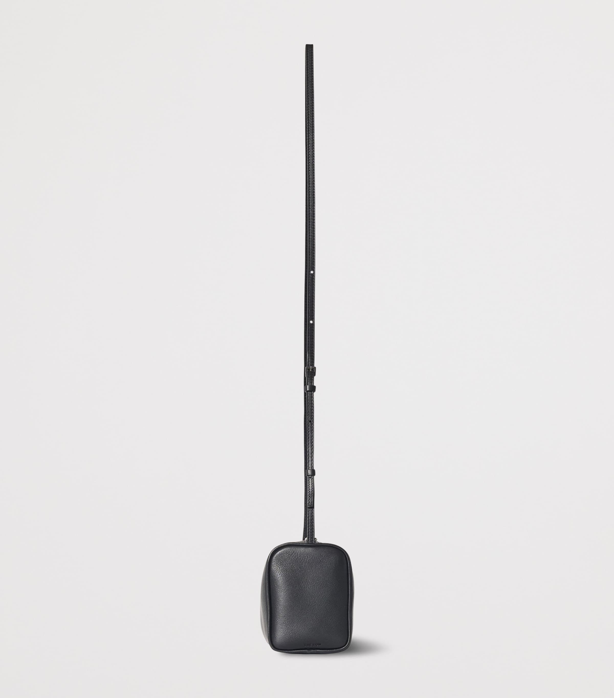 The Row Black 90s Leather Cross-Body Bag | Harrods SG